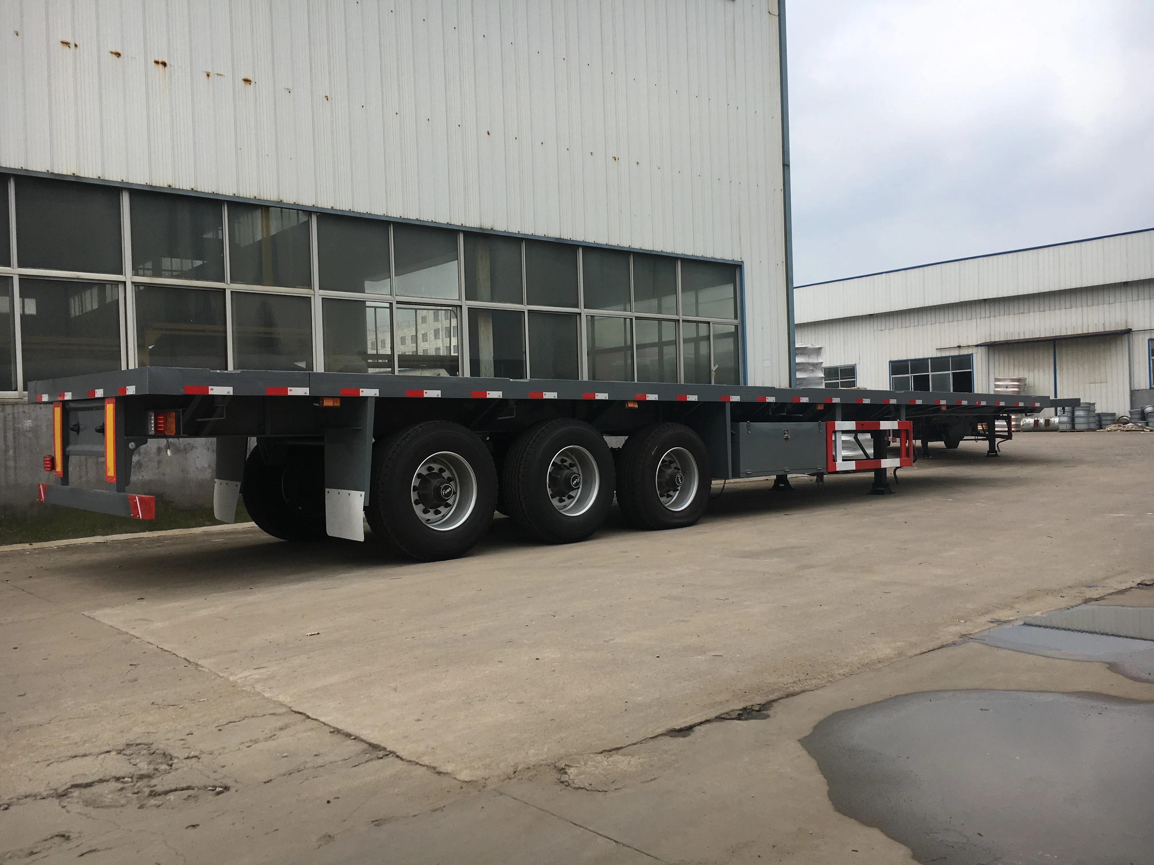 Factory 3 Axle 4 Axle 60t Flatbed Flat Bed Container Semi Trailer In Africa Flatbed Trailer ...