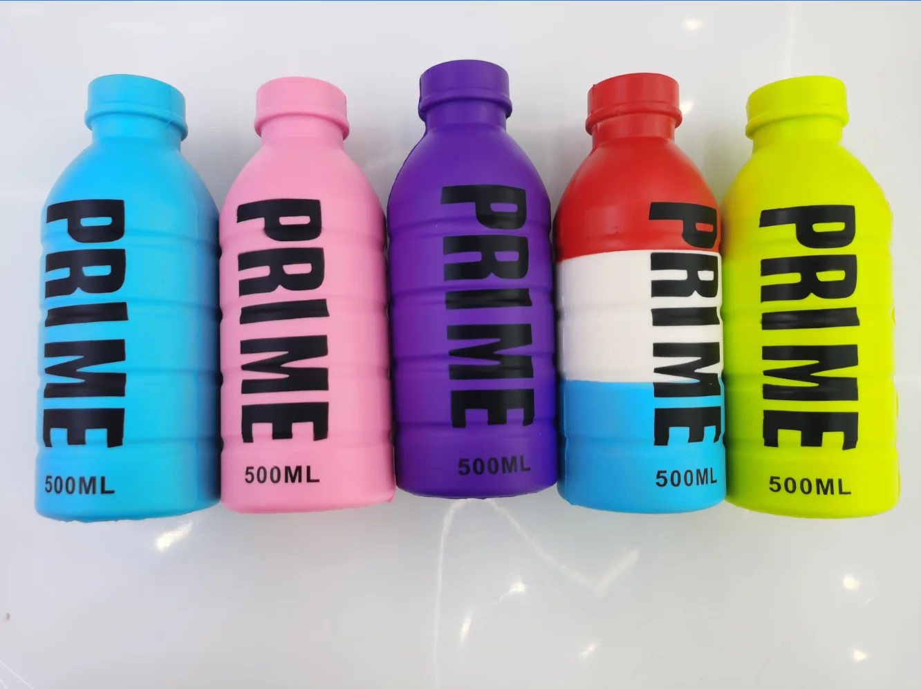 S304 Kids Party Favors - Prime Soft Drink Bottle Squishy Toys