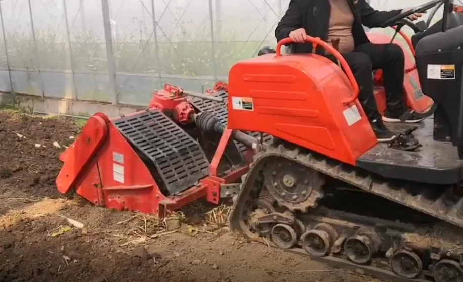 Mini Crawler Garden Tractor with Dozer Blade Working on Garden Orchard ...