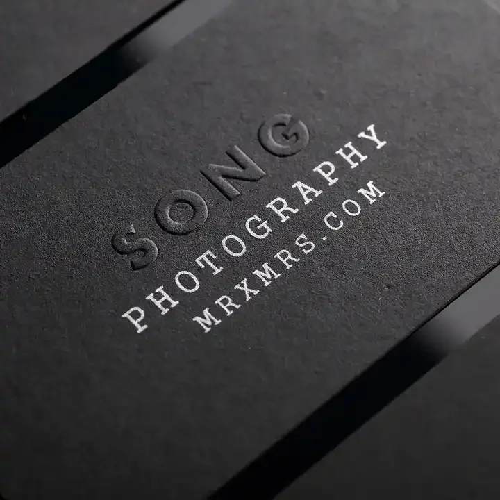 Luxury Black Embossed Business Card with Gold Foil Stamping
